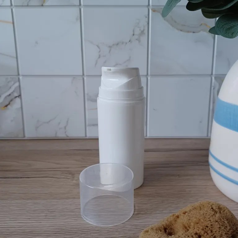 Airless lahvička 100 ml bílá, víčko transparentní od DomaLEP.cz
