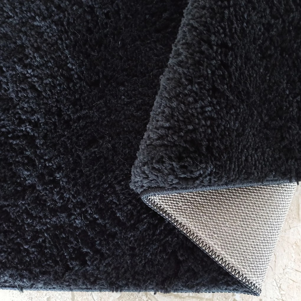 DY Černý protiskluzový huňatý koberec Camel Rozměr: 60x100 cm