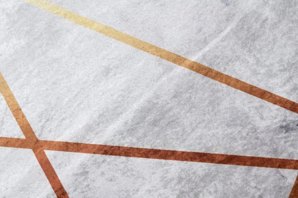 Šedý trendy koberec s jednoduchým zlatým vzorem Šířka: 120 cm | Délka: 170 cm