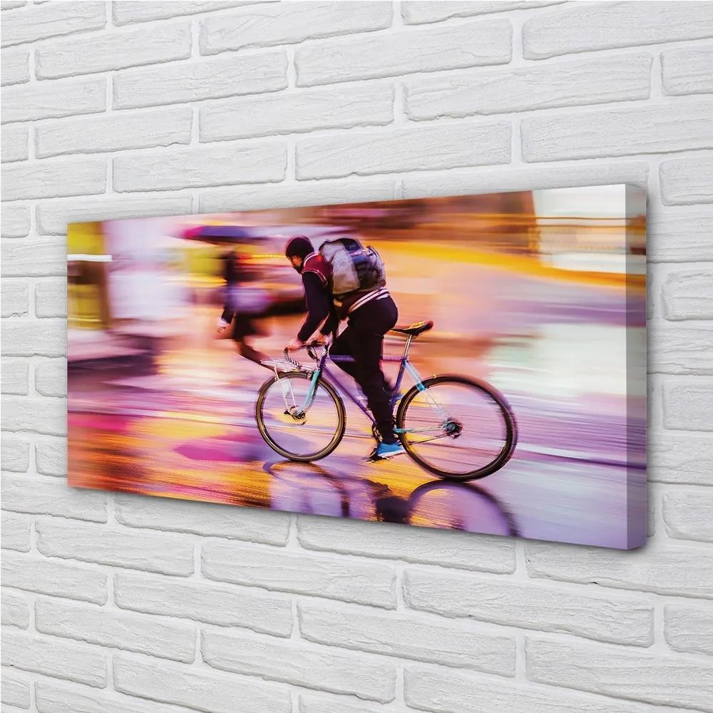 Obrazy na plátně Bike světla muže 100x50 cm