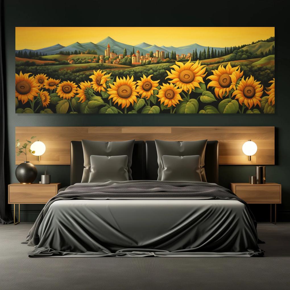Obraz na plátně - Slunečnicové pole s vesničkou v kopcích FeelHappy.cz Velikost obrazu: 120 x 40 cm