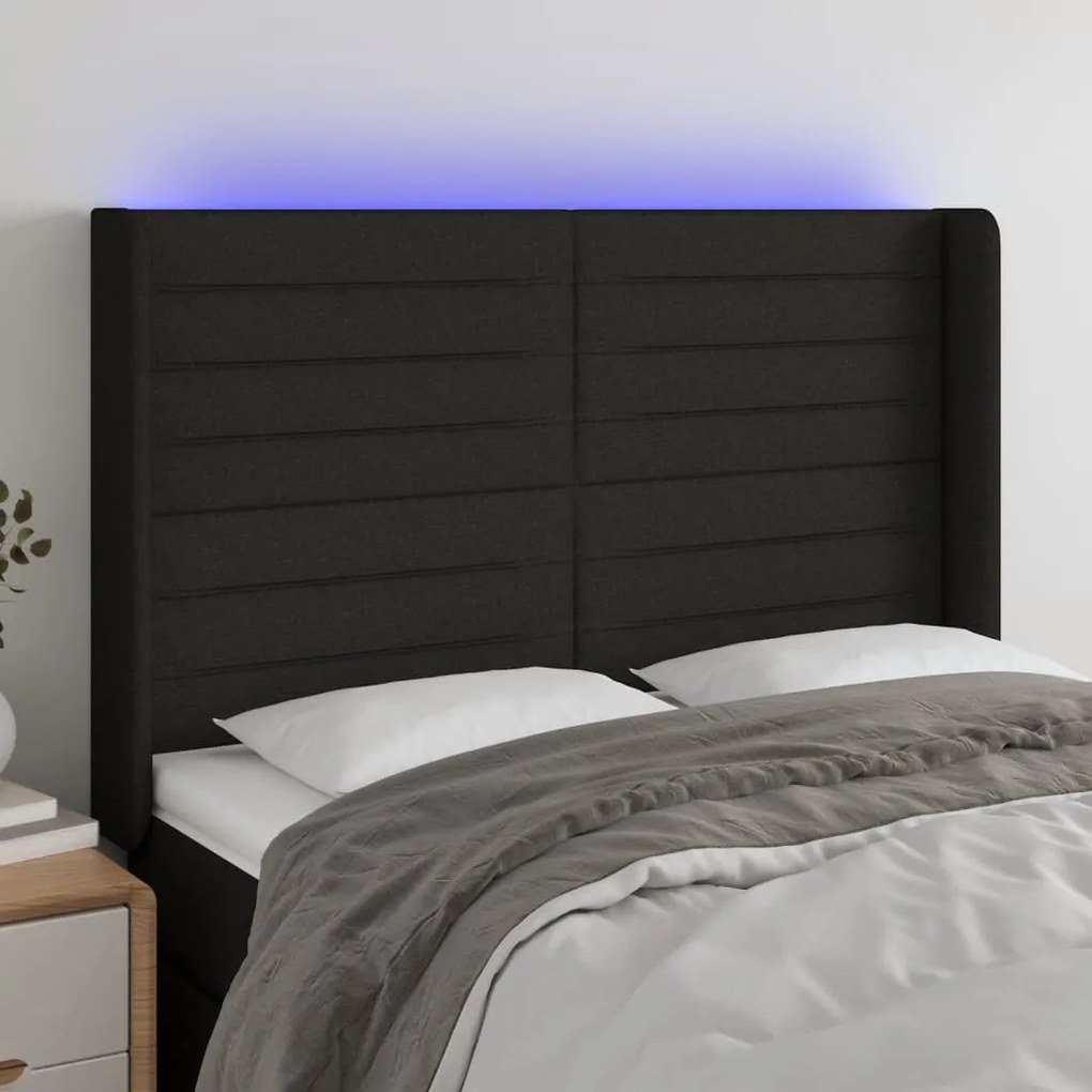 Čelo postele s LED černé 147 x 16 x 118/128 cm textil 3124188