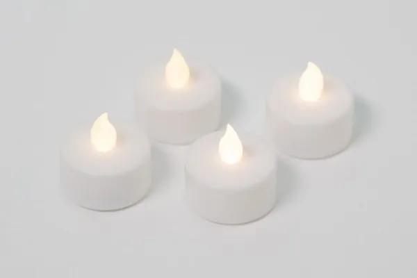 Dekorativní sada - 4 čajové svíčky - bílá Nexos Trading GmbH & Co. KG D42988