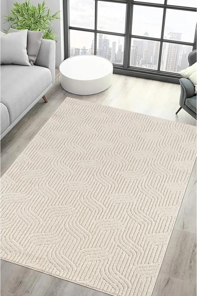 Krémový pratelný koberec 120x170 cm Loopy – Mila Home