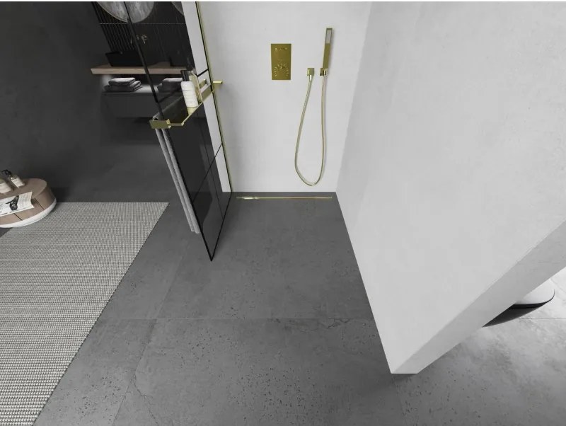 Mexen Kioto+ L, sprchová zástěna Walk-In s poličkou a věšákem 90 x 200 cm, 8mm čiré sklo černý vzor, ​​zlatý lesklý profil, 800-090-123-50-77