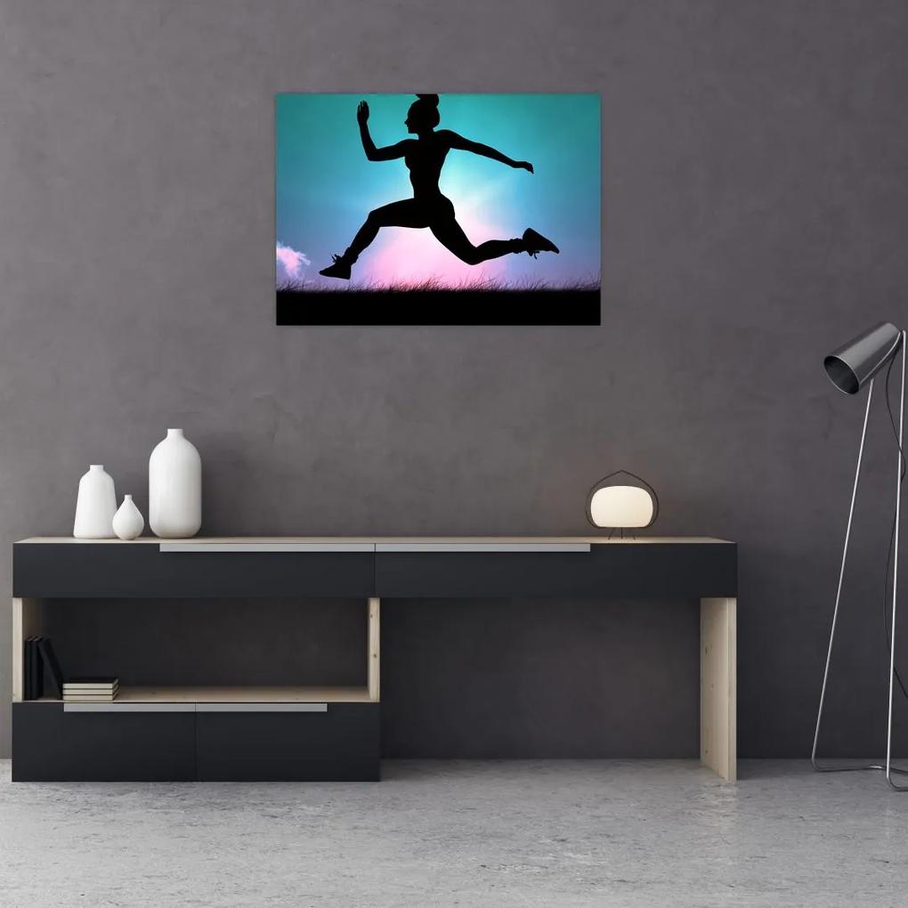 Skleněný obraz skákající siluety ženy (70x50 cm)
