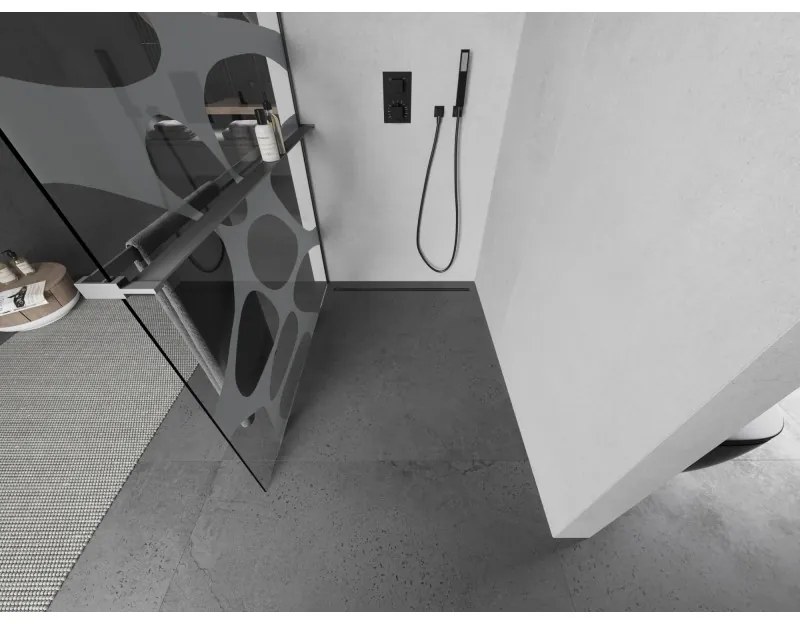 Mexen Kioto+ L, sprchová zástěna Walk-In s poličkou a věšákem 100 x 200 cm, 8mm čiré sklo bílý vzor, grafitový profil, 800-100-123-95-97