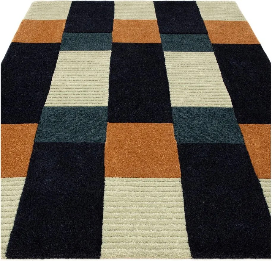 Tmavě modrý ručně tkaný koberec z recyklovaných vláken 120x170 cm Franka – MADE