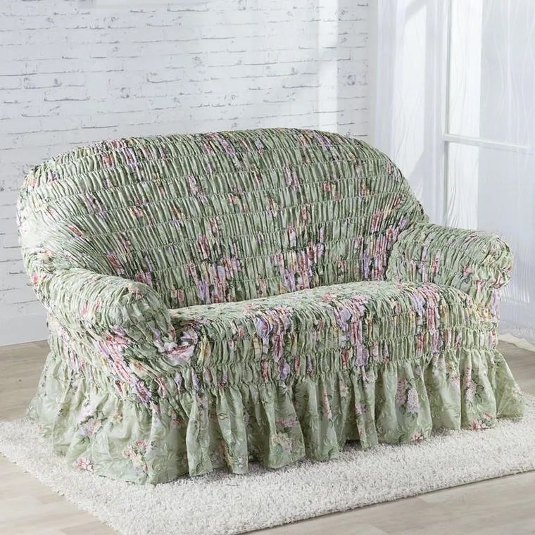 Napínací potahy s volánem FIORELA zelená křeslo (š. 60 - 110 cm)