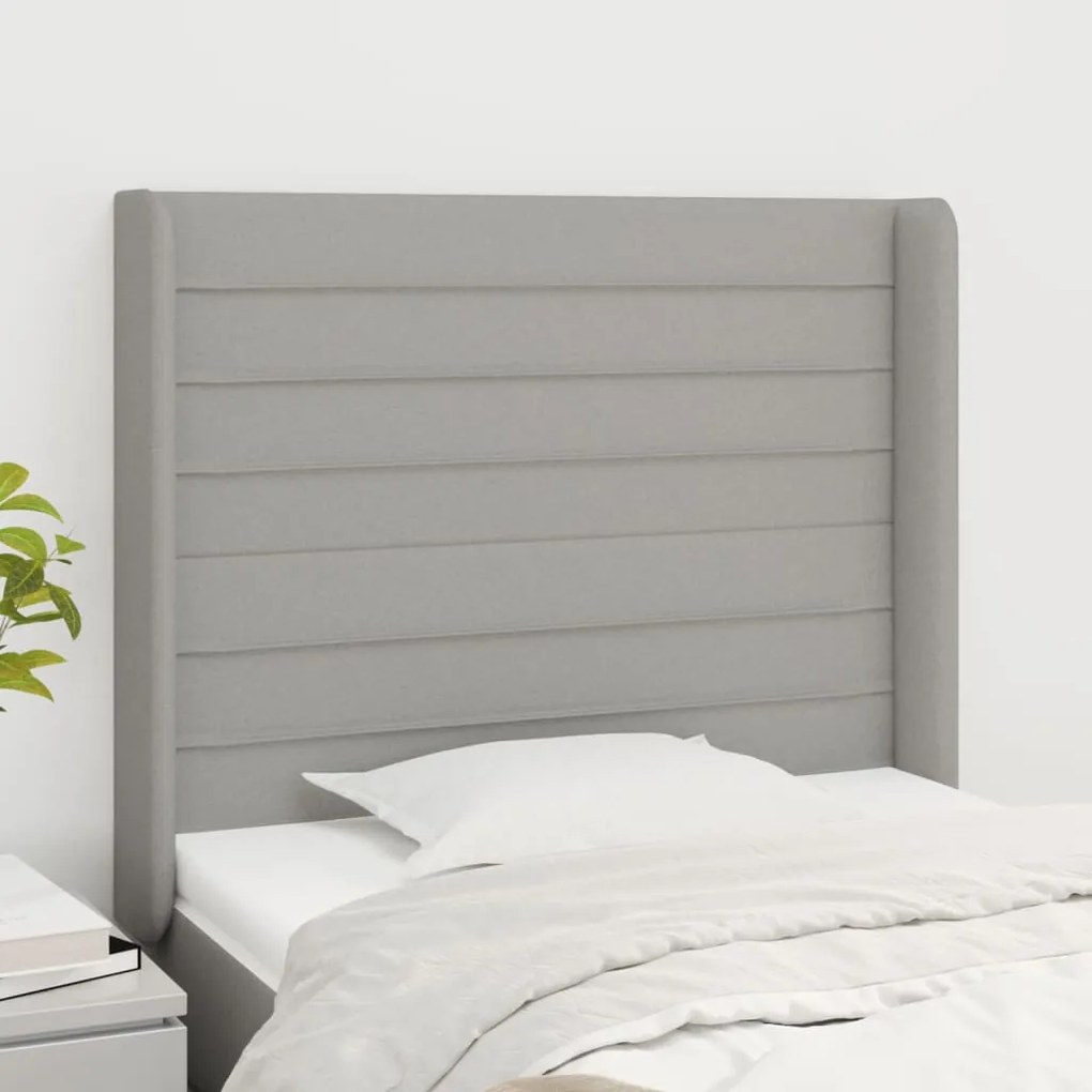 Čelo postele typu ušák světle šedé 83x16x118/128 cm textil 3119694