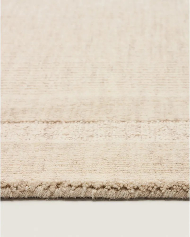 Krémový ručně tkaný vlněný koberec 200x300 cm Dalena – Kave Home