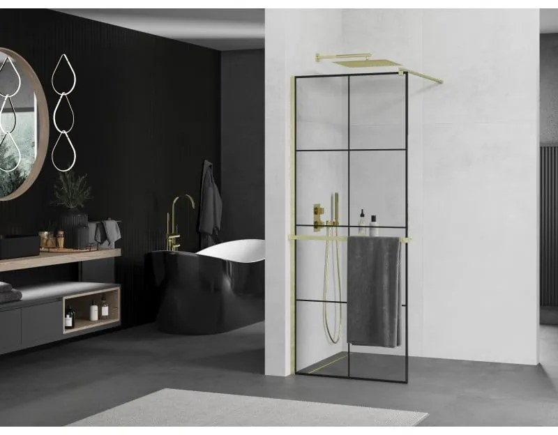 Mexen Kioto+, sprchová zástěna Walk-In s poličkou a věšákem 70 x 200 cm, 8mm čiré sklo černý vzor, zlatý matný profil, 800-070-121-55-77
