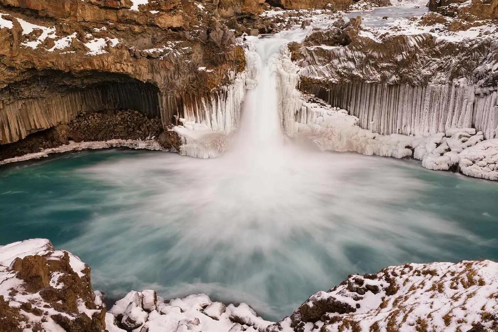 DIMEX | Samolepicí vliesová fototapeta na zeď Islandský vodopád MA-5-3184 | 375 x 250 cm | modrá, bílá, šedá
