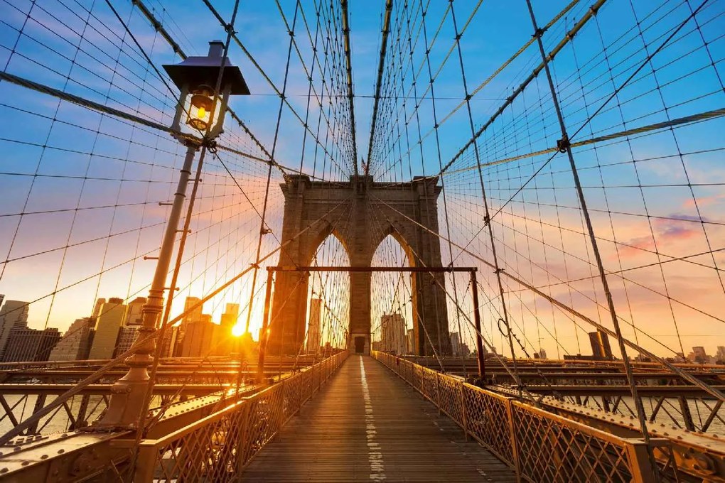 DIMEX | Samolepicí vliesová fototapeta na zeď Brooklyn Bridge při západu slunce MA-5-2966 | 375 x 250 cm | modrá, žlutá, hnědá