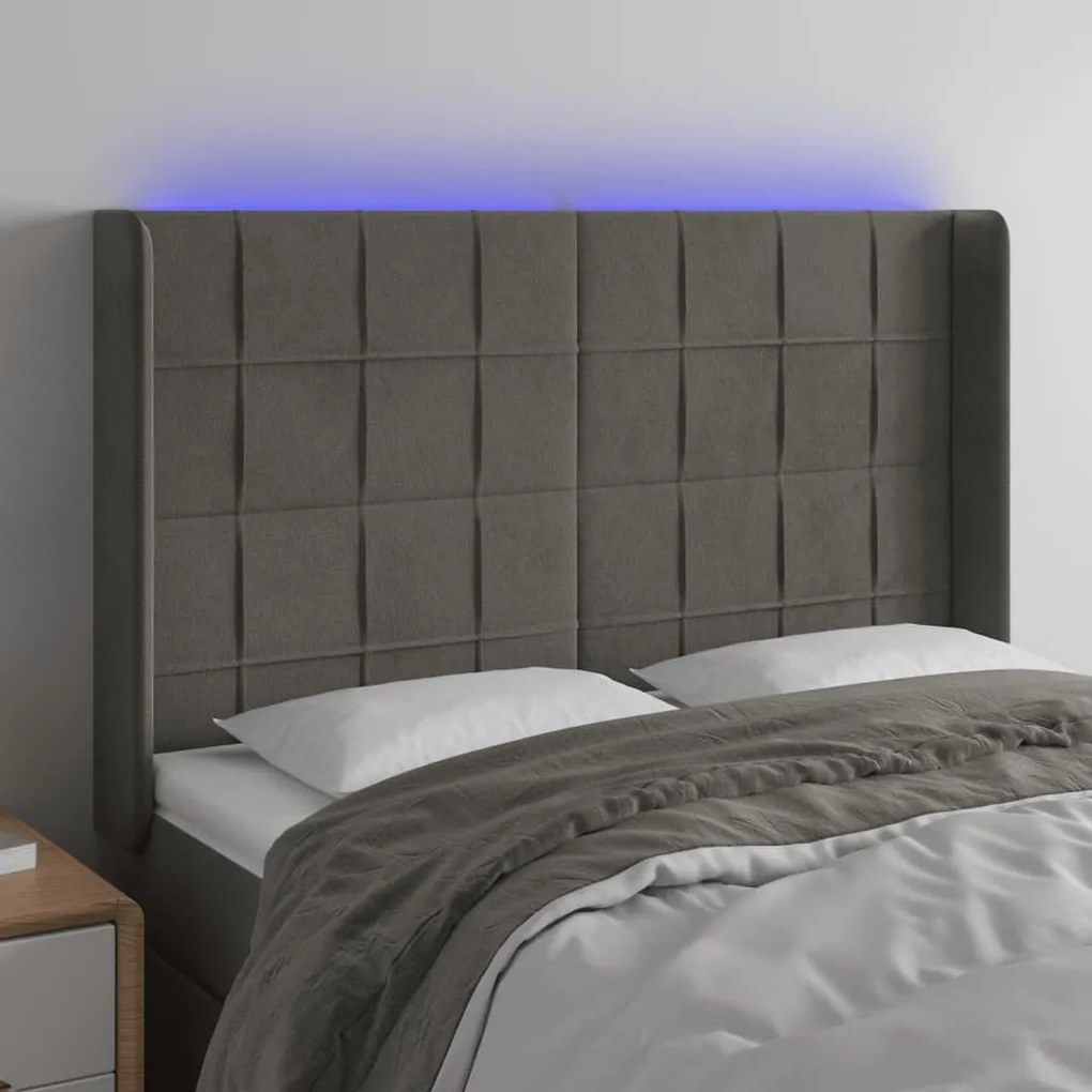 Čelo postele s LED tmavě šedé 147 x 16 x 118/128 cm samet 3124097