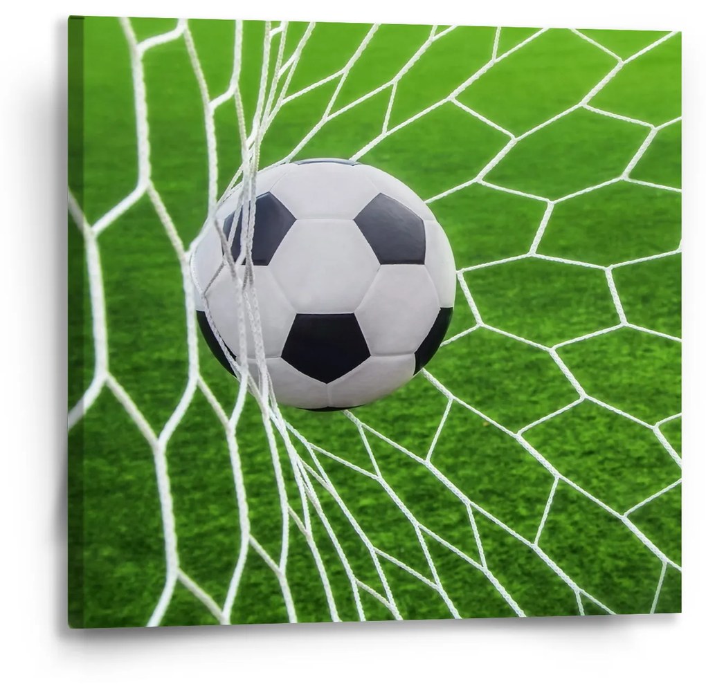 Obraz SABLIO - Fotbalový míč v bráně 50x50 cm