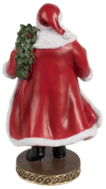 Červená vánoční dekorace Santa Claus na hnědém podstavci držící dárek a vánoční bobule – 23 cm