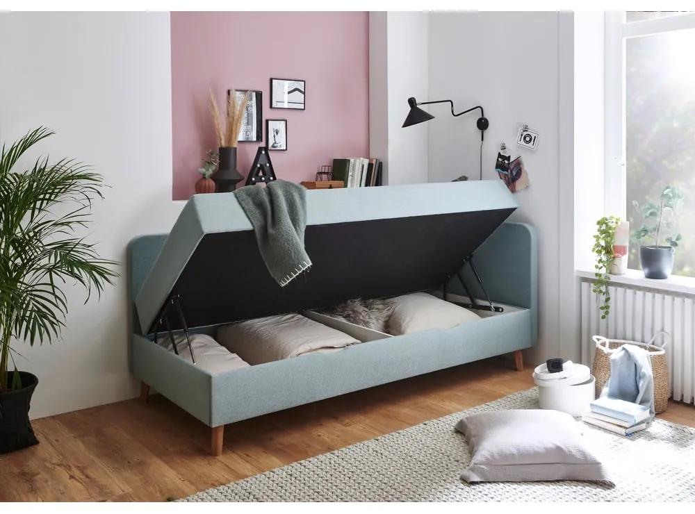 Světle modrá čalouněná jednolůžková postel s úložným prostorem 90x200 cm Cabana – Meise Möbel