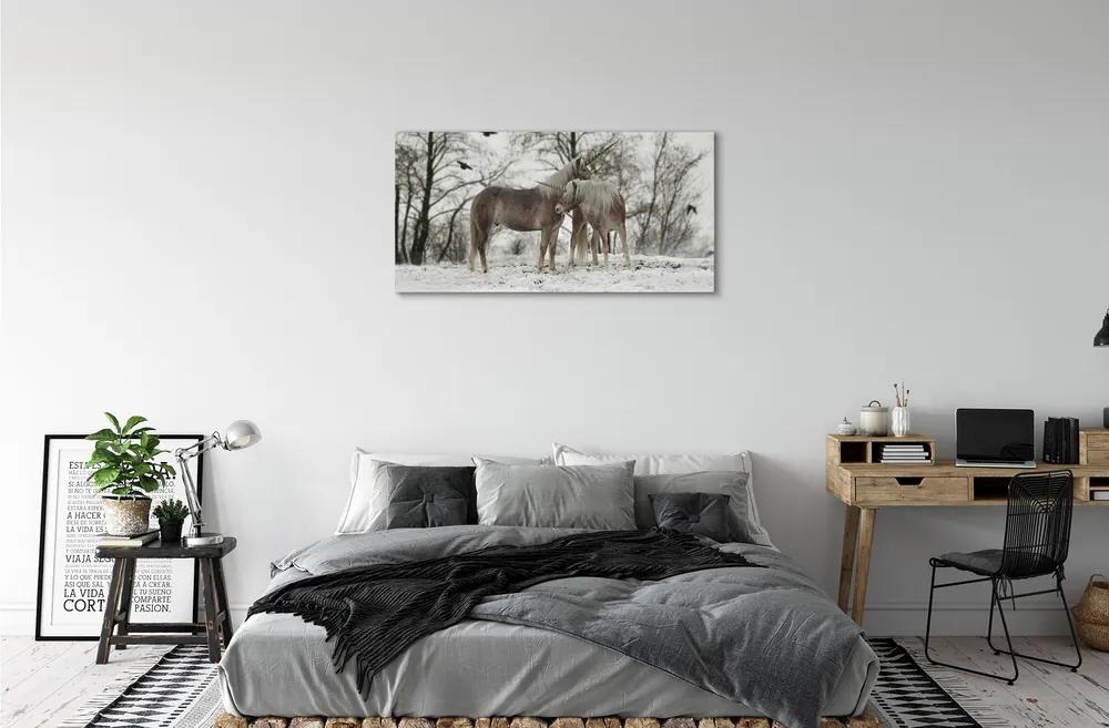 Obrazy na plátně Zimní lesní jednorožci 125x50 cm