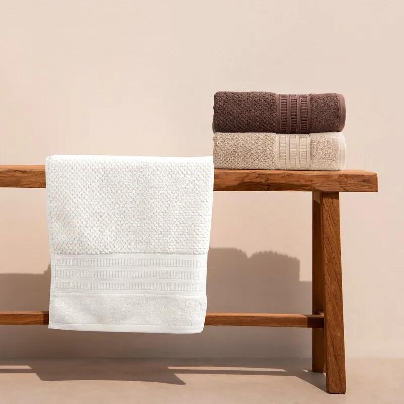 Bavlněný krémový ručník ROSITA s rýžovou strukturou a žakárovou bordurou s geometrickým vzorem Rozměr: 30 x 50 cm