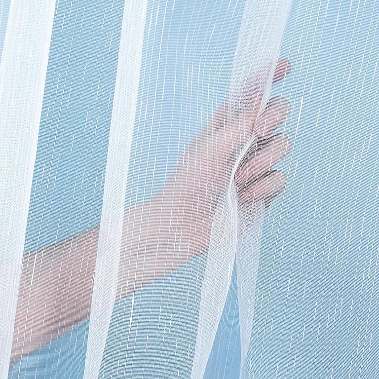 Goldea bílá pletená záclona - prší - metráž 140 cm