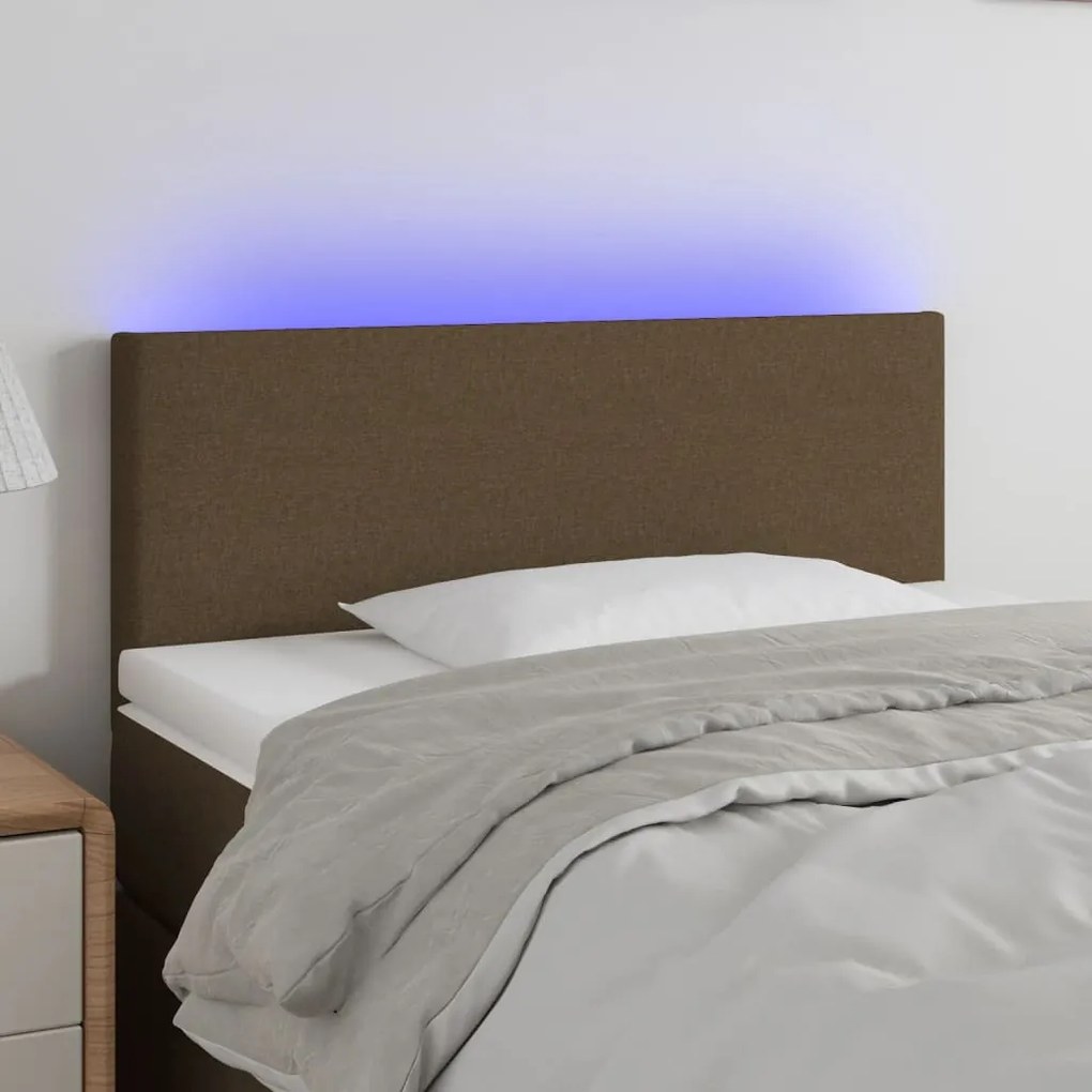 Čelo postele s LED tmavě hnědé 90x5x78/88 cm textil 3121317