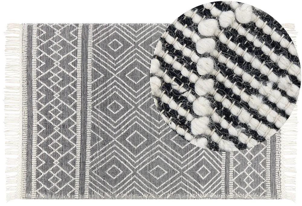 Vlněný koberec 160 x 230 cm černý/bílý SAVUCA Beliani