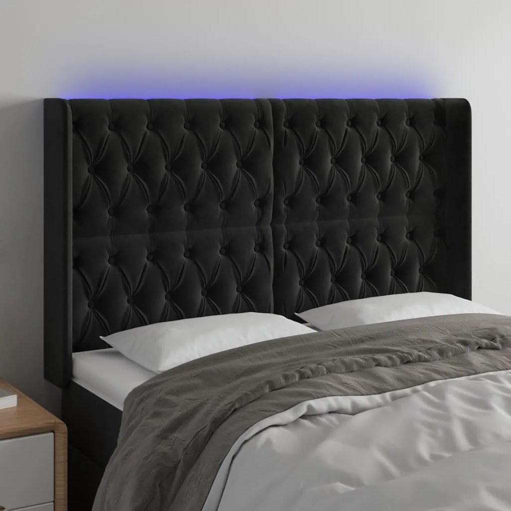Čelo postele s LED černé 147 x 16 x 118/128 cm samet