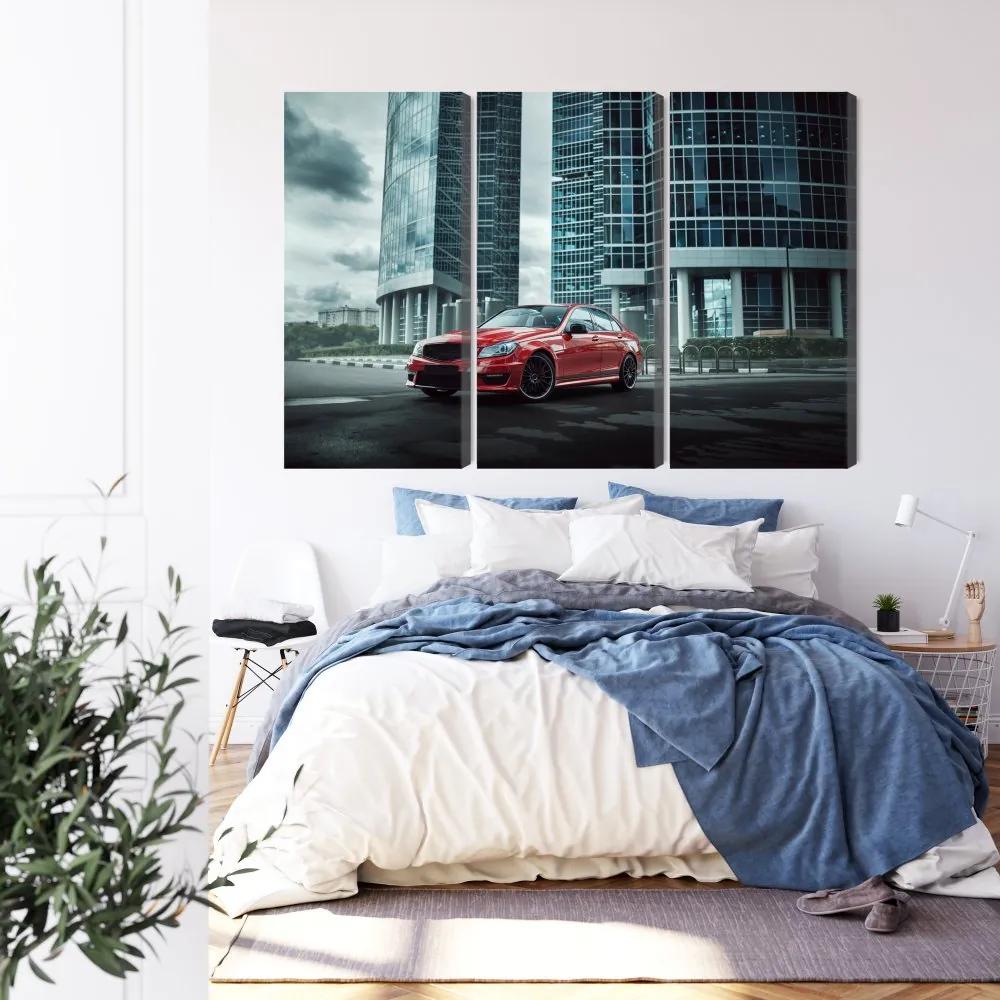 Vícedílný obraz Červené Auto Na Pozadí Moderních Mrakodrapů Nedostatek Nedostatek Plátno Canvas 150x100