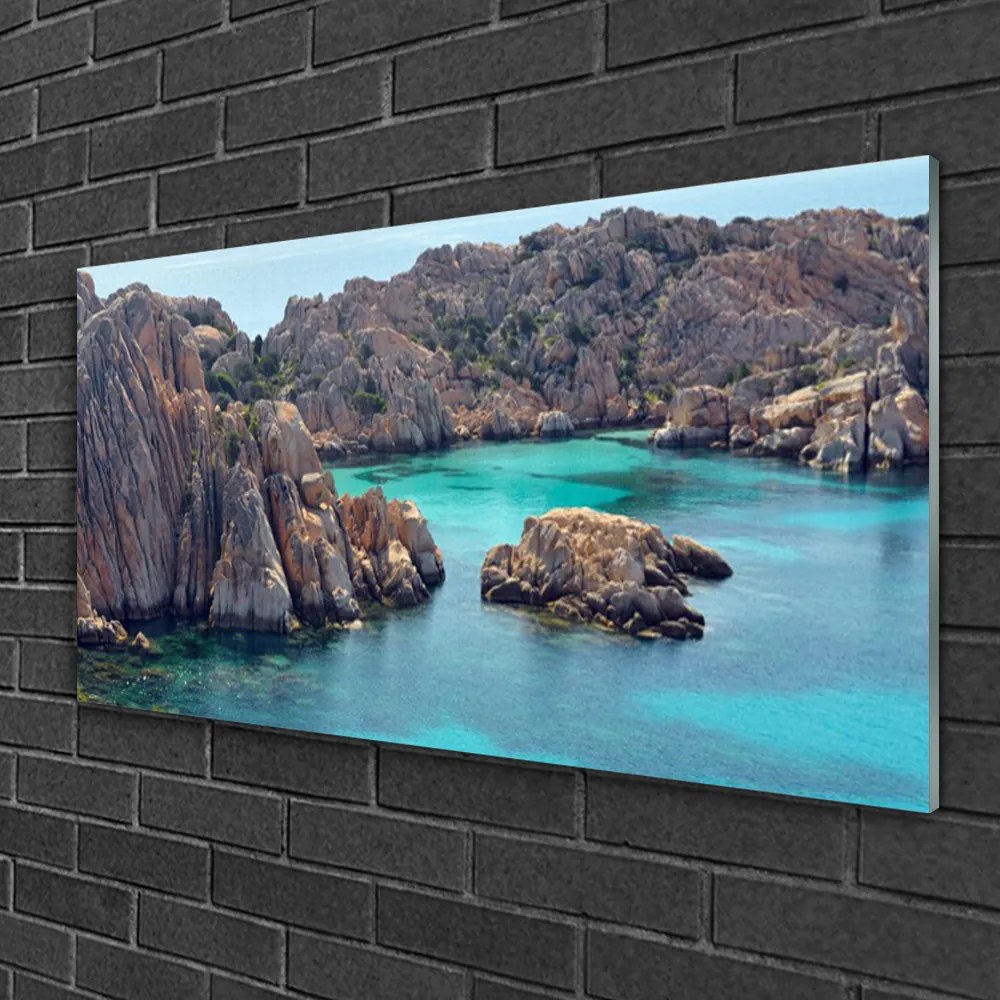 Obraz na skle Záliv Skály Moře Krajina 140x70 cm