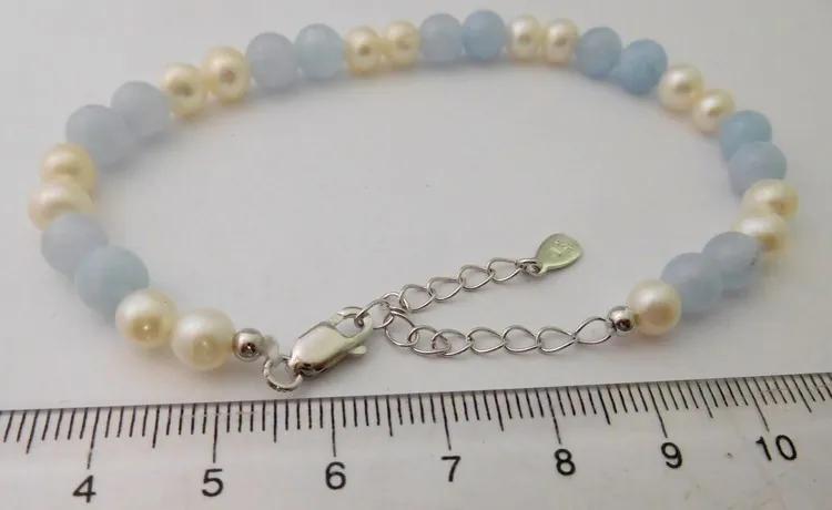 Dámský perlový stříbrný rhodiovaný náramek s kultivovanými čirými perlami 925/1000 18cm - 23cm 030853600001