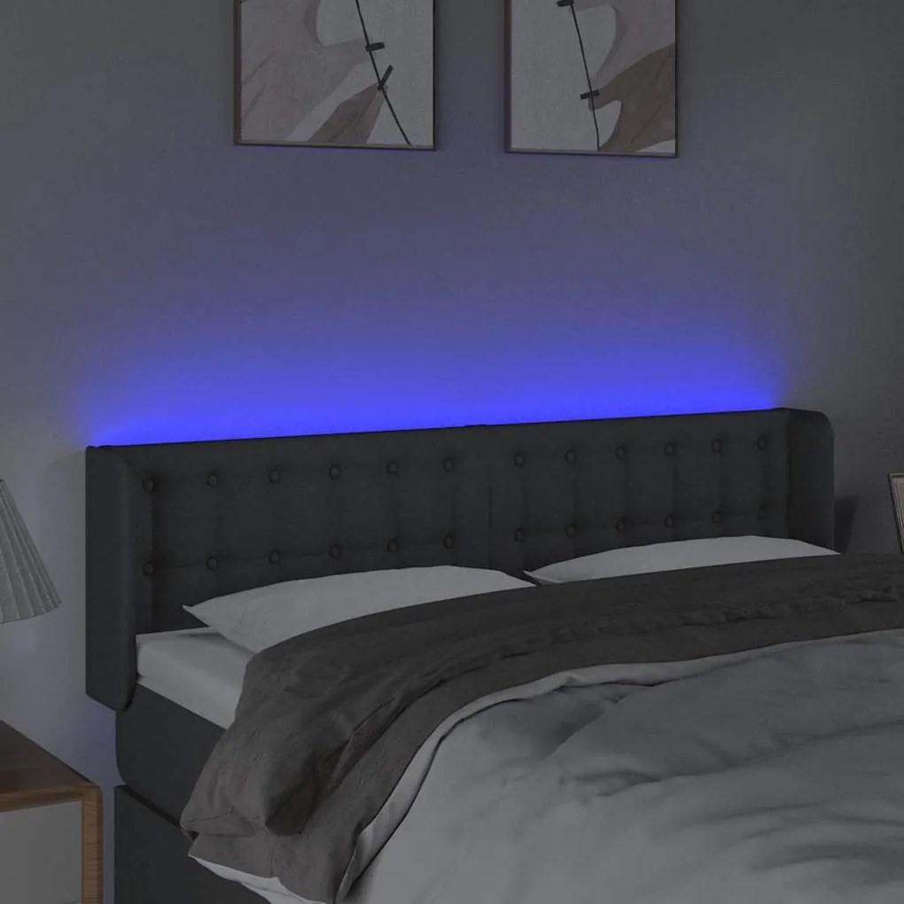 Čelo postele s LED tmavě šedé 147 x 16 x 78/88 cm textil 3123669
