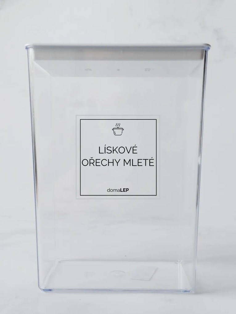 LÍSKOVÉ OŘECHY MLETÉ – průhledná samolepka na dózu, základní písmo, 5 x 5 cm | DomaLEP