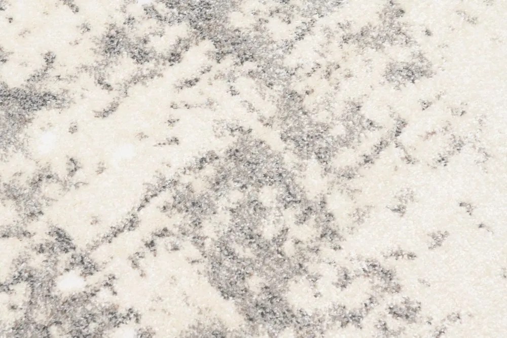 Krémový designový koberec s šedým abstraktním vzorem Šířka: 120 cm | Délka: 170 cm
