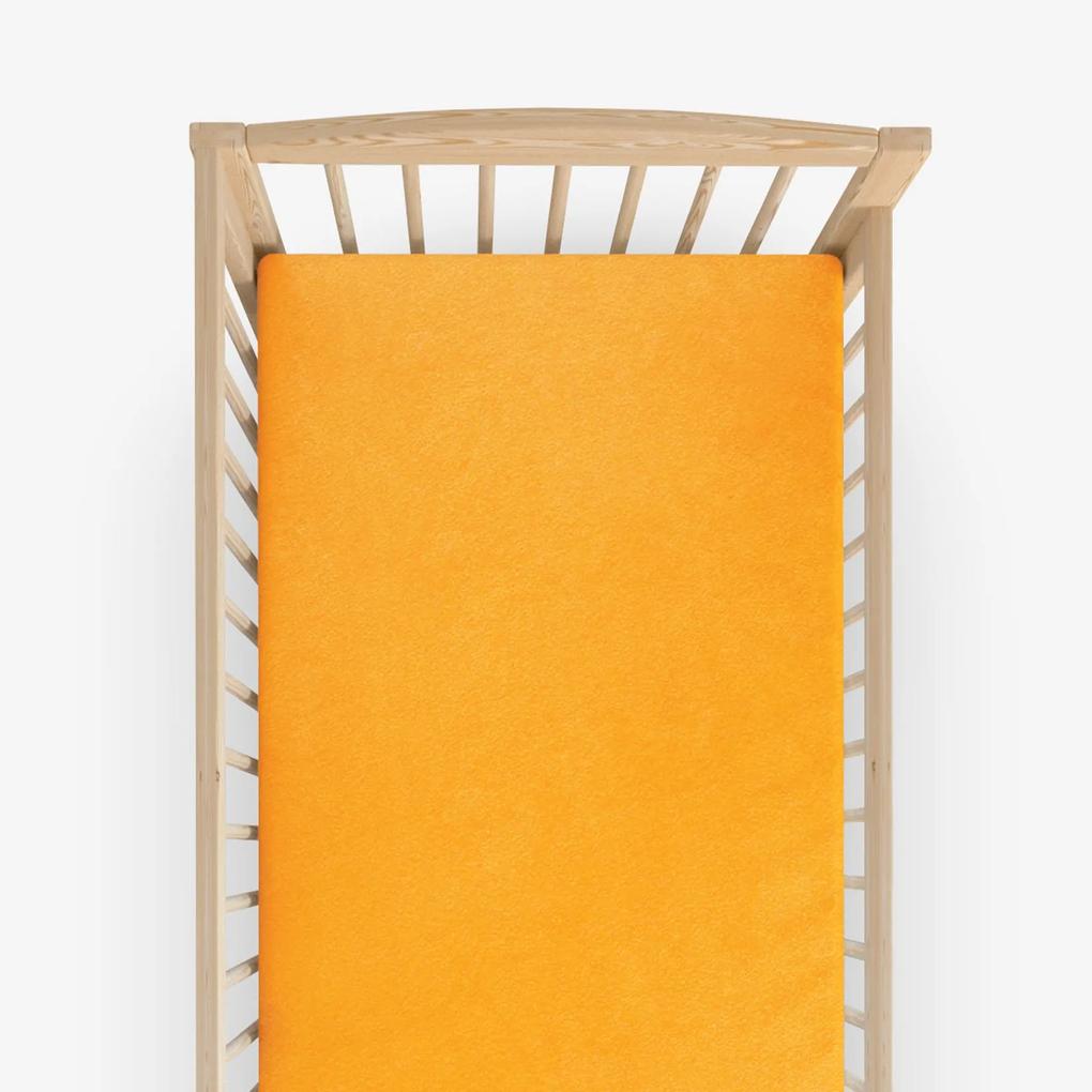 Goldea nepropustné froté prostěradlo do dětské postýlky - oranžové 60 x 120 cm