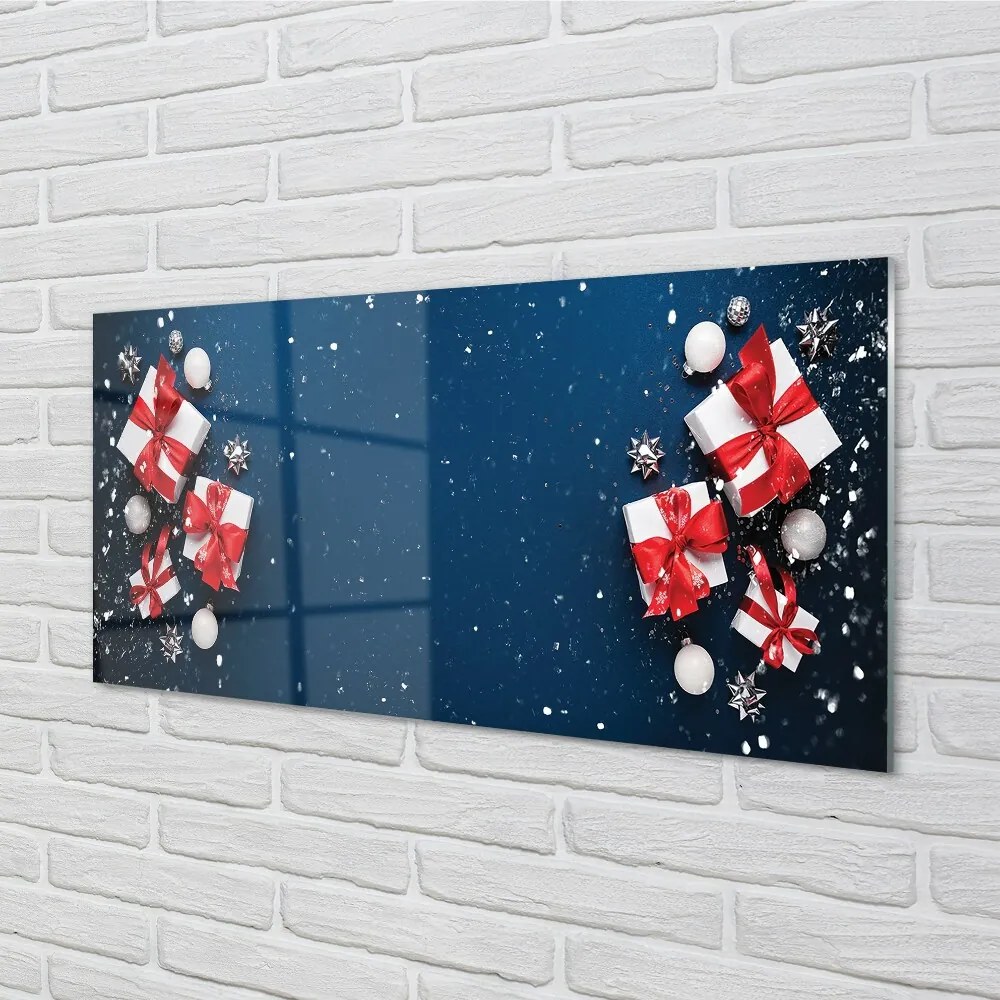 Obraz na skle Dárky cetky sníh 140x70 cm