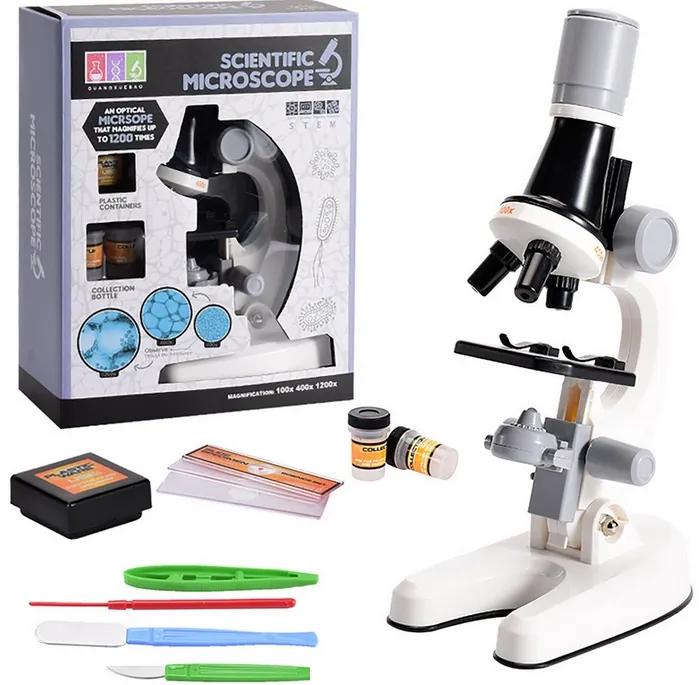 Mikroskop s příslušenstvím bílý