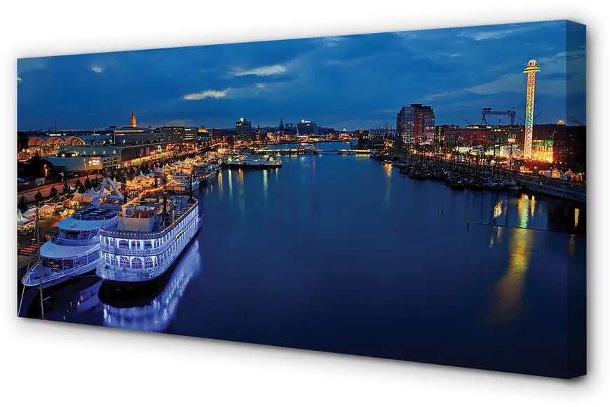 Obrazy na plátně Loď moře město na noční obloze 125x50 cm
