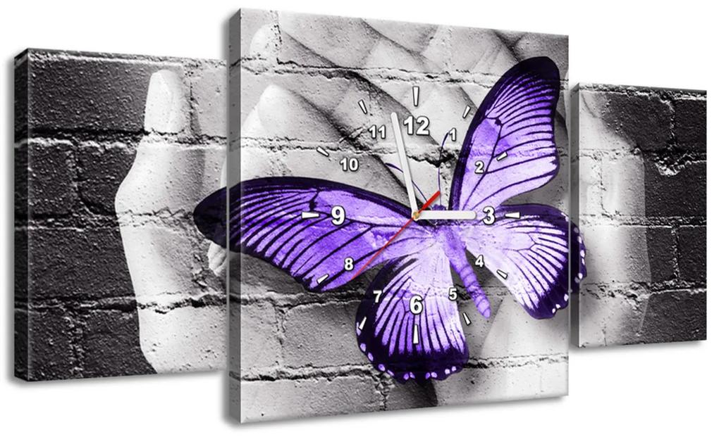 Gario Obraz s hodinami Fialový motýl na dlaních - 3 dílný Rozměry: 30 x 90 cm