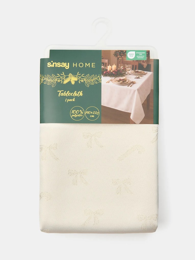 Sinsay - Vánoční ubrus na stůl se zlatým vzorem mašliček a cukrových holí - krémová