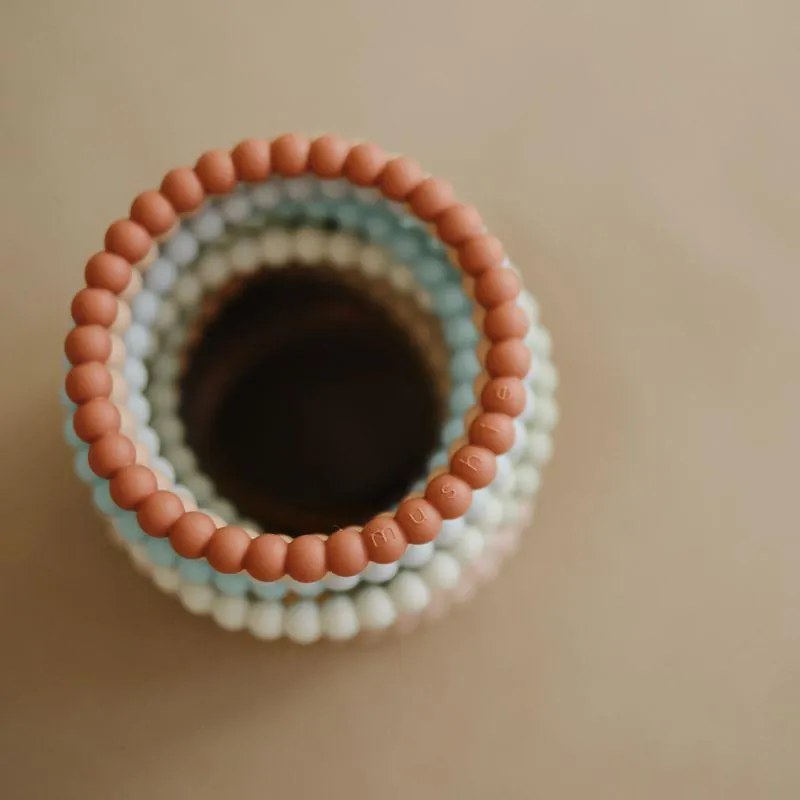 Mushie Náramkové kousátko ze silikonu Pearl 3 ks Lilac-cyan-soft-peach