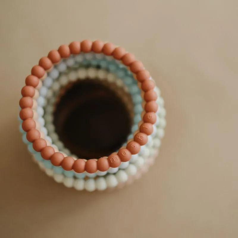 Mushie Náramkové kousátko ze silikonu Pearl 3 ks Mellow-terracotta