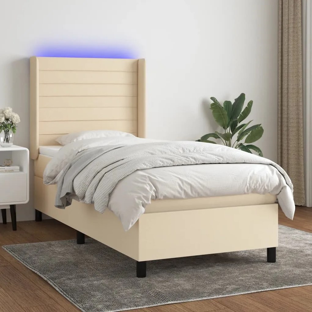 Box spring postel s matrací a LED krémová 90x200 cm textil