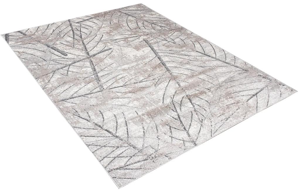 Moderní béžový koberec s motivem jemných lístků