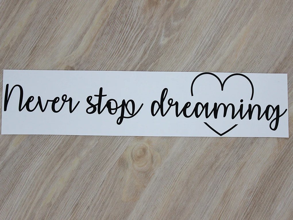 Never stop dreaming samolepka na zeď 40 x 9 cm