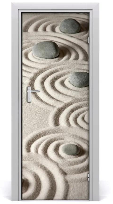 Fototapeta na dveře kamení na písku 75x205 cm
