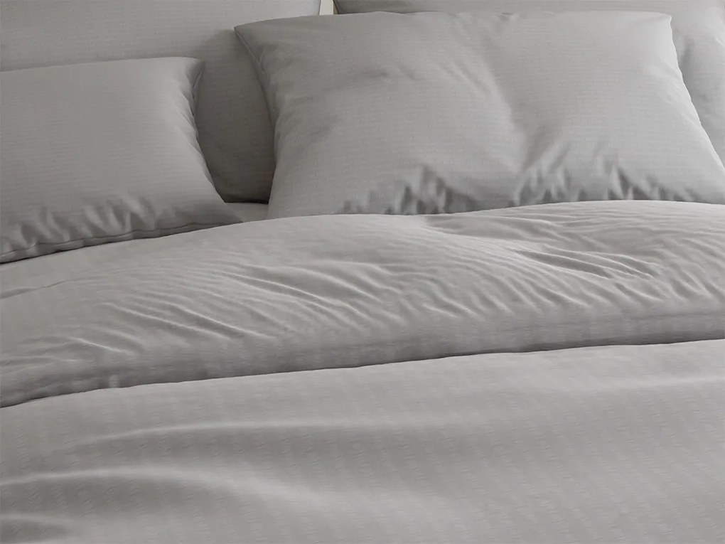 Bavlněné povlečení s krepovou úpravou LUXERA světle šedé hotelová kapsa II.jakost Rozměr povlečení: 70 x 90 cm | 140 x 200 cm