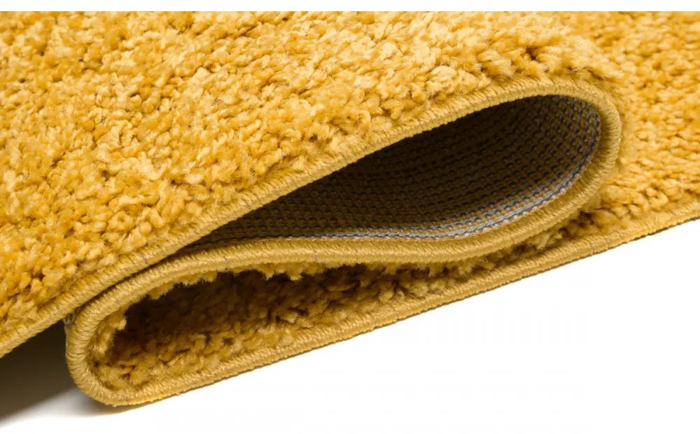 Kusový koberec shaggy Parba hořčicový atyp 60x200cm
