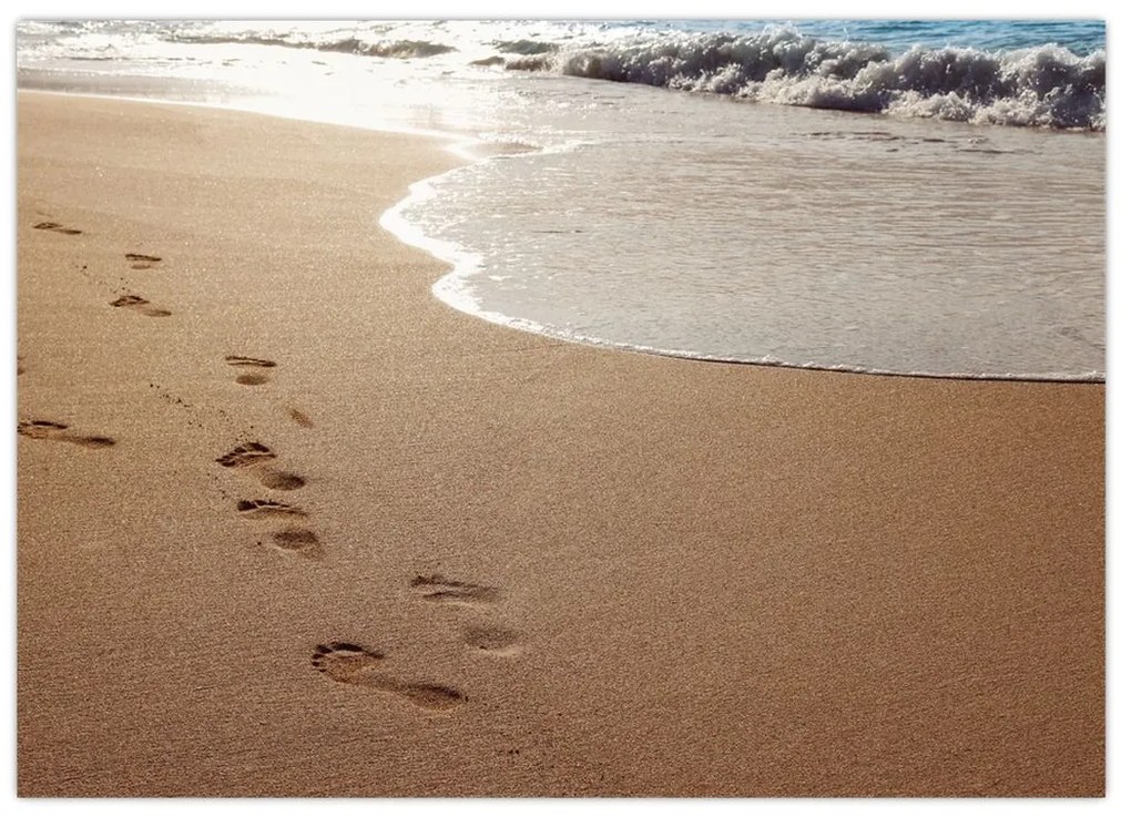 Obraz - stopy v písku a moře (70x50 cm)