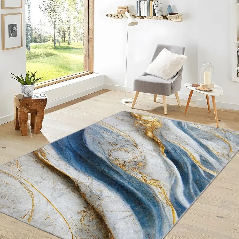 Modrý pratelný koberec 160x230 cm Golden Spill – Mila Home
